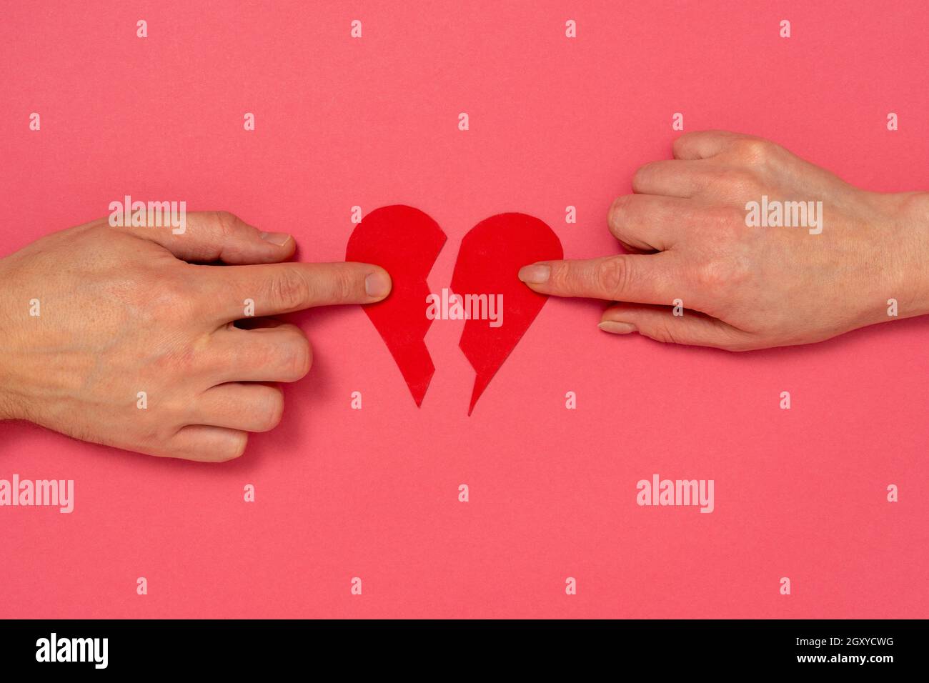 Love and relationship problems concept - male and female hands holding ...