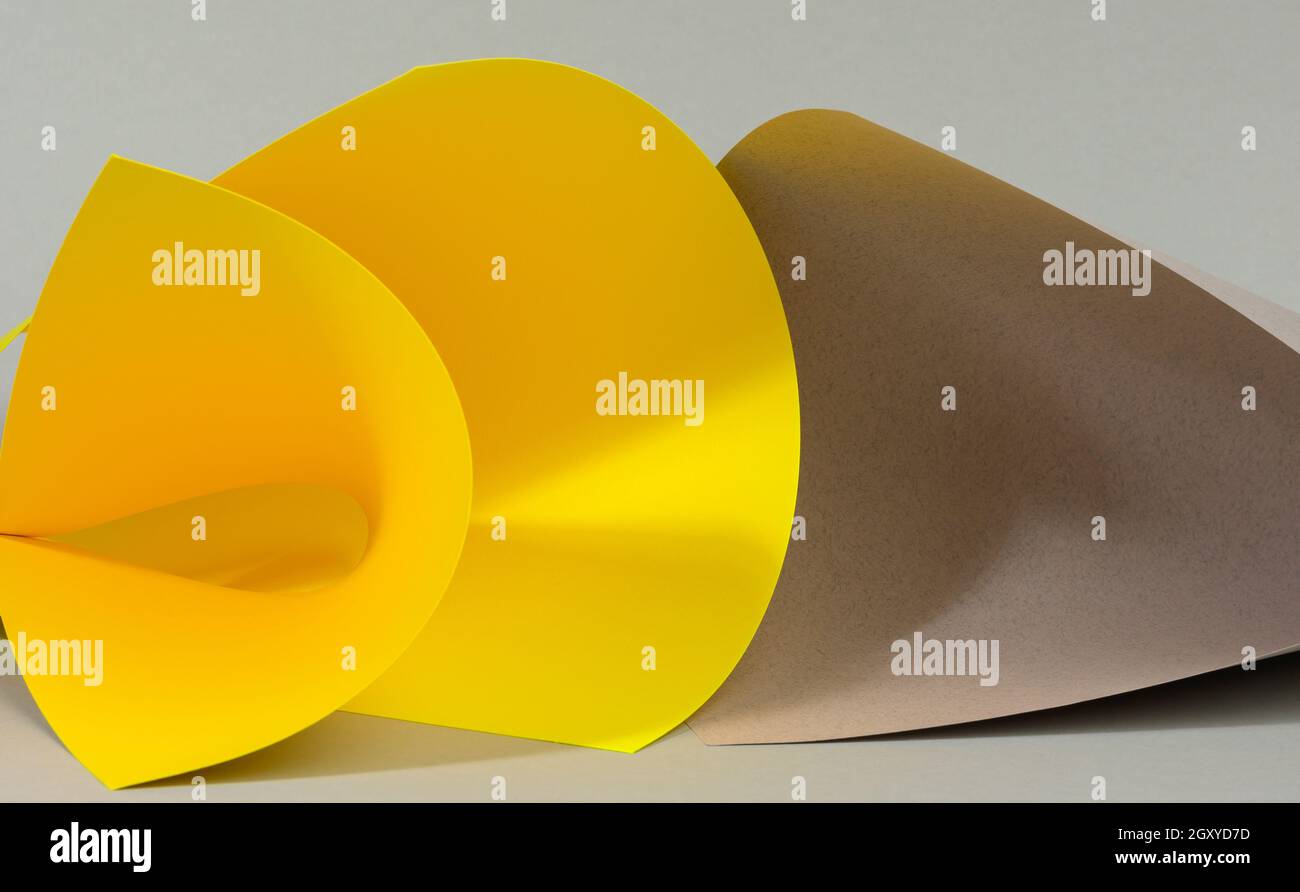 abstract yellow-gray background from twisted sheets with shadow ...