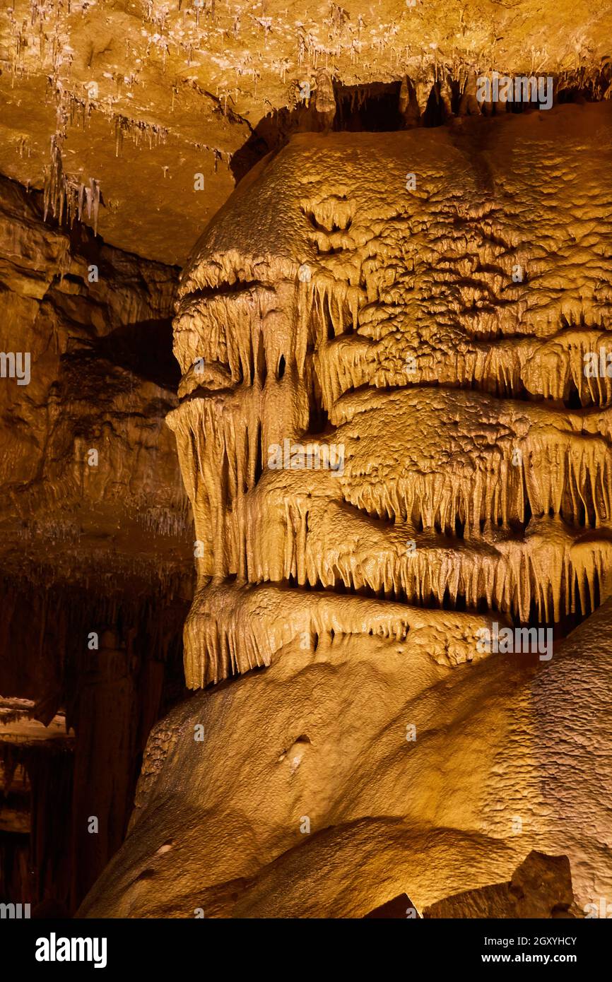 Large cave vertical detail of rock formations stalagmites and ...