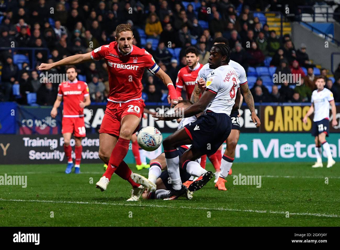 Nottingham Forest's captain Michael Dawson blocks a shot from Bolton ...