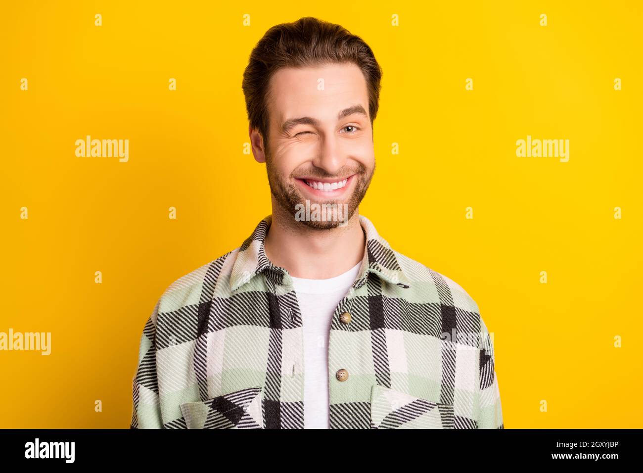 Photo of young handsome man happy positive smile wink eye flirty ...