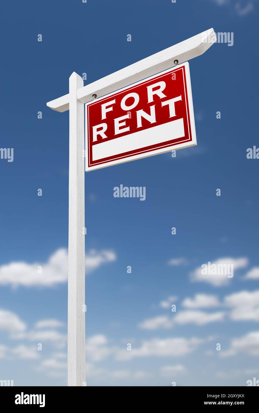 Right Facing For Rent Real Estate Sign on a Blue Sky with Clouds Stock ...