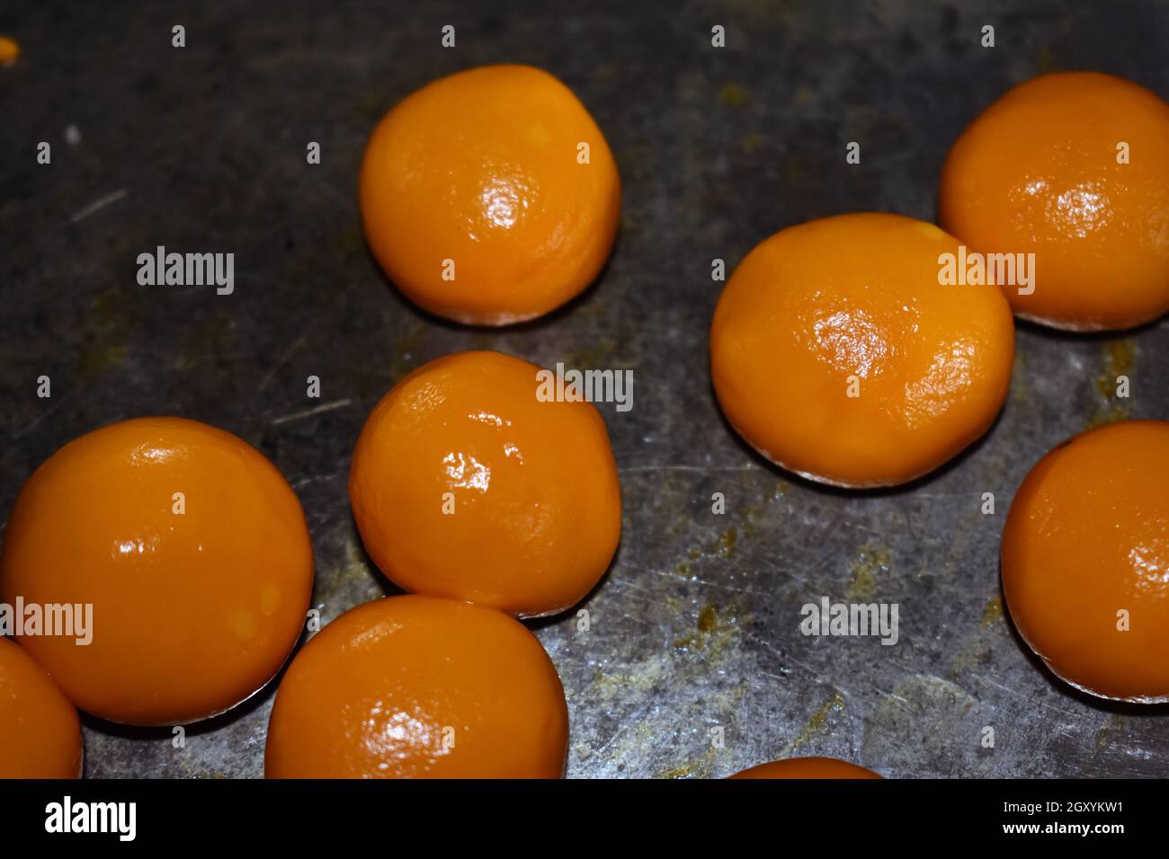 A high angle shot of uncooked gulab jamun- sweet Indian dessert Stock ...