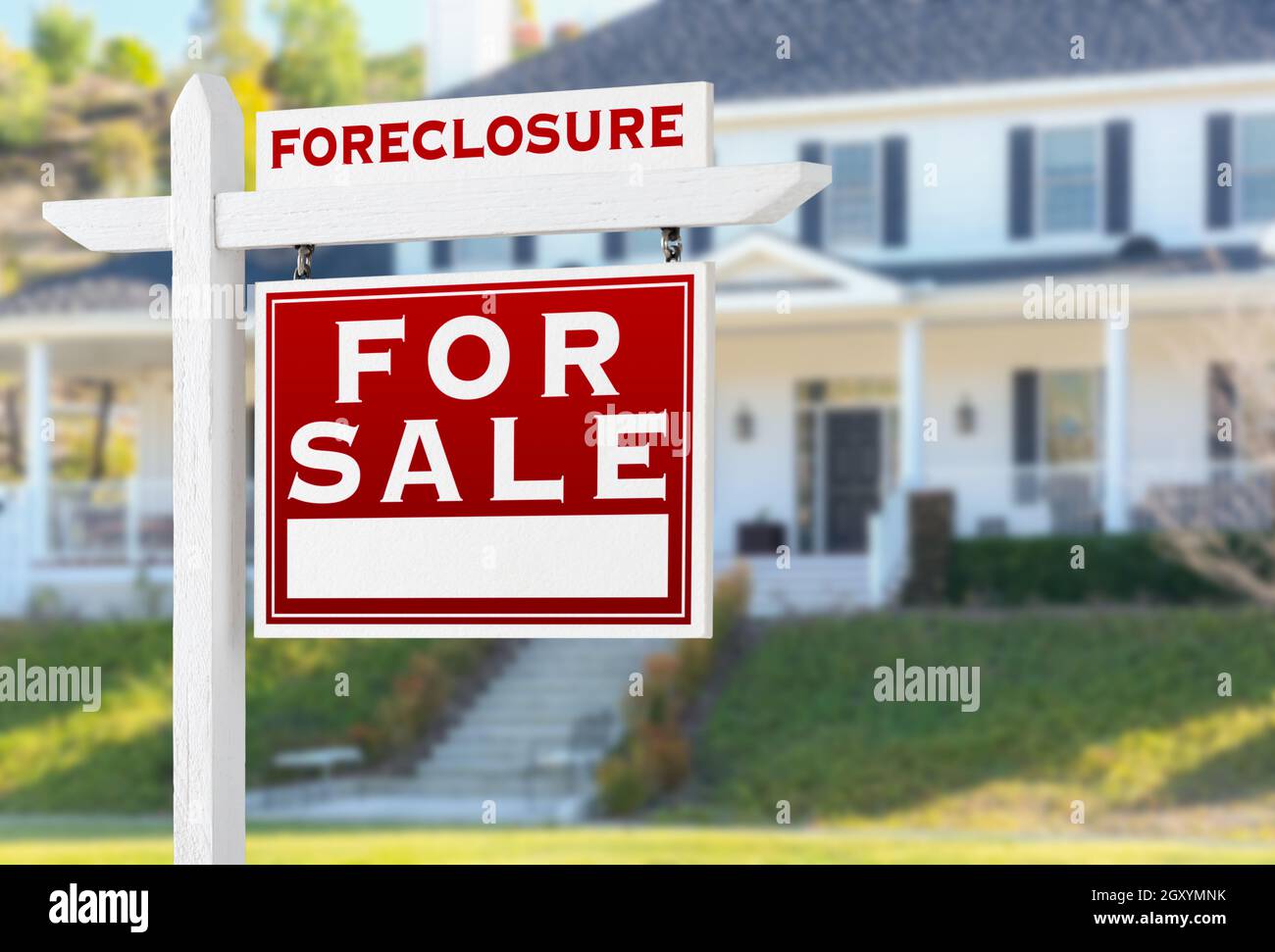 House with foreclosure bank owned sign hi-res stock photography and ...