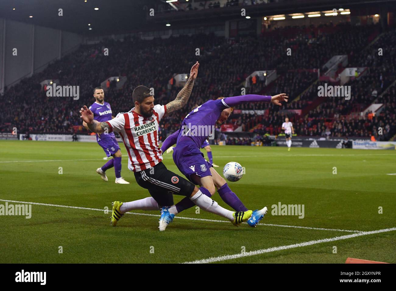Sheffield United's Kieron Freeman and Stoke City's captain Ryan Woods ...