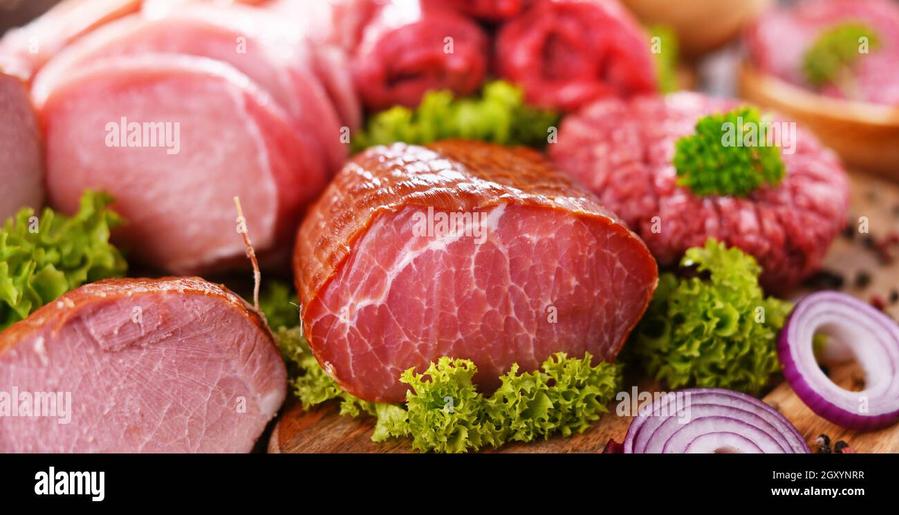 Composition with assorted meat products Stock Photo - Alamy