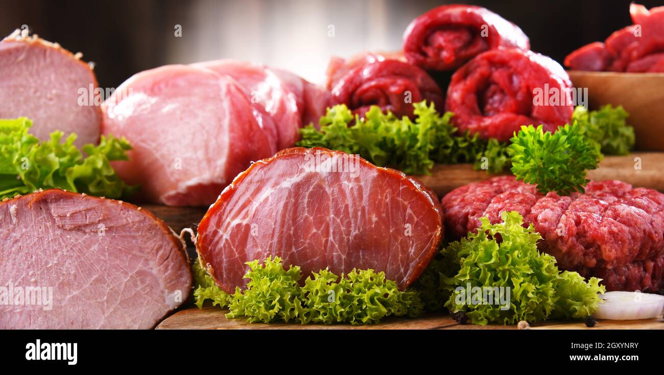 Composition with assorted meat products Stock Photo - Alamy
