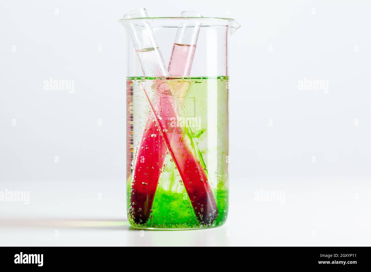 Test flasks with color samples on light grey background Stock Photo - Alamy