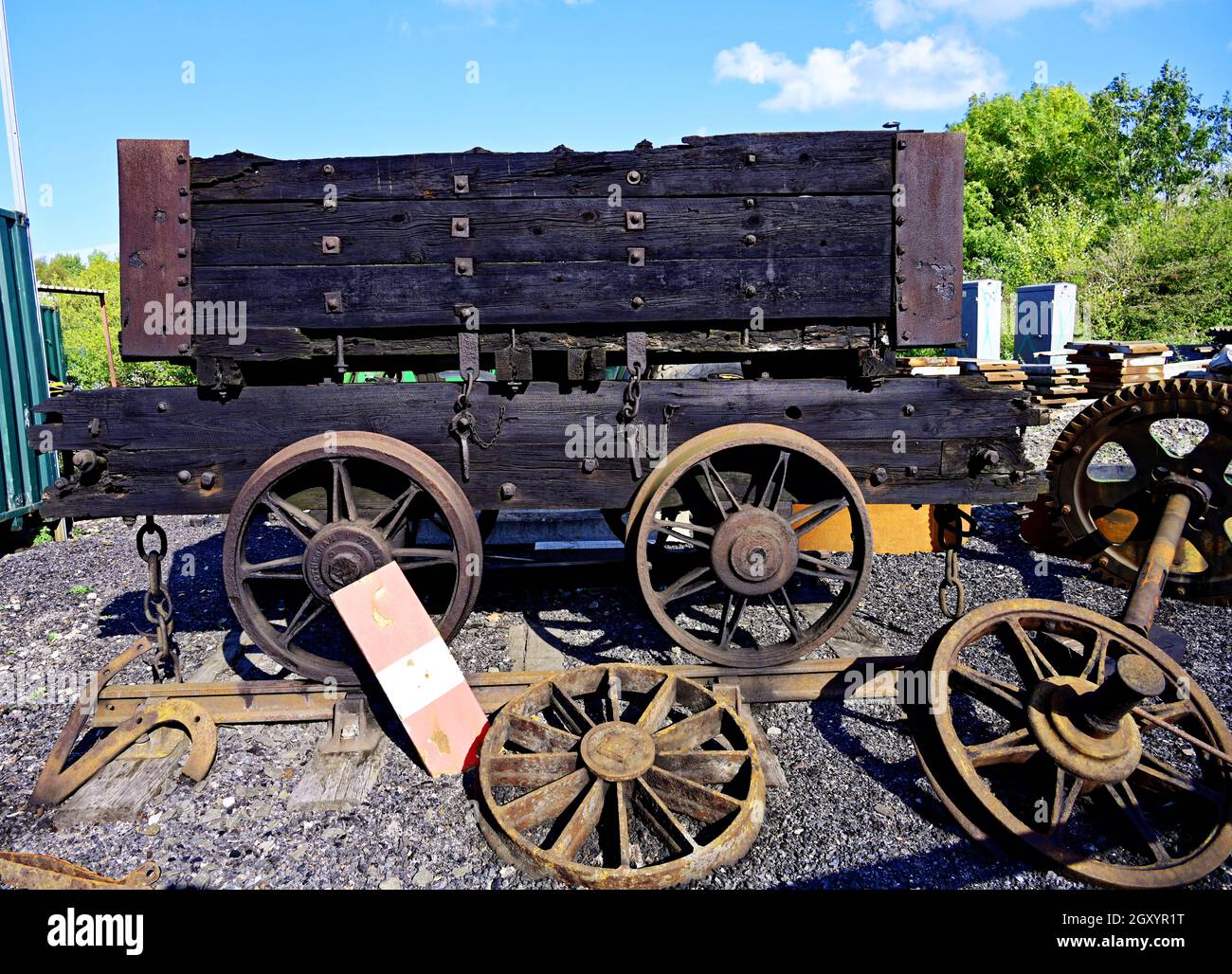 Ancient steam locomotive wooden coal wagon spare and wheels at North ...