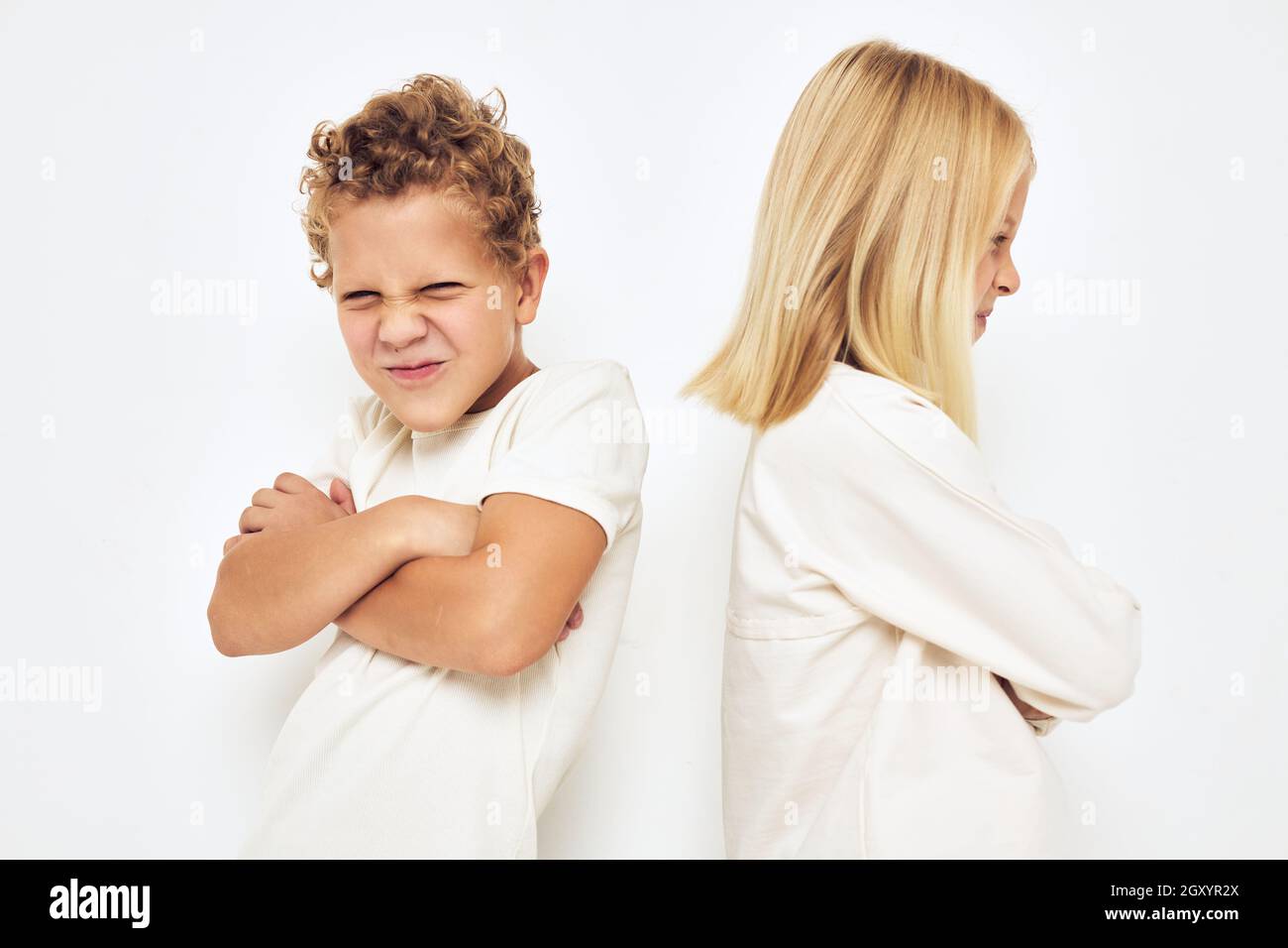 The boy is offended by the little girl quarrel resentment light ...