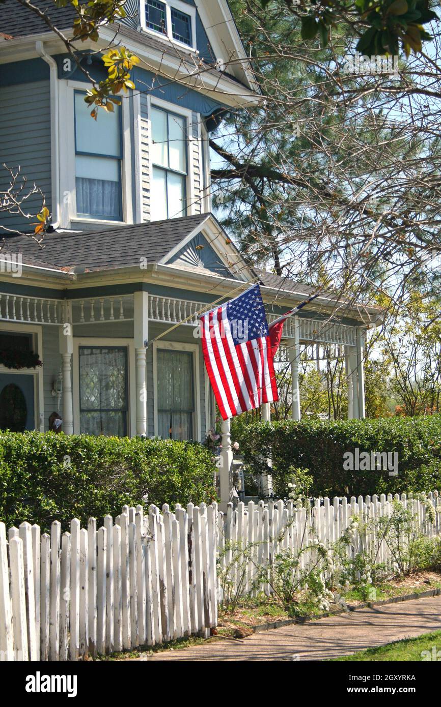 American Flag on Rural Victorian Home Stock Photo - Alamy
