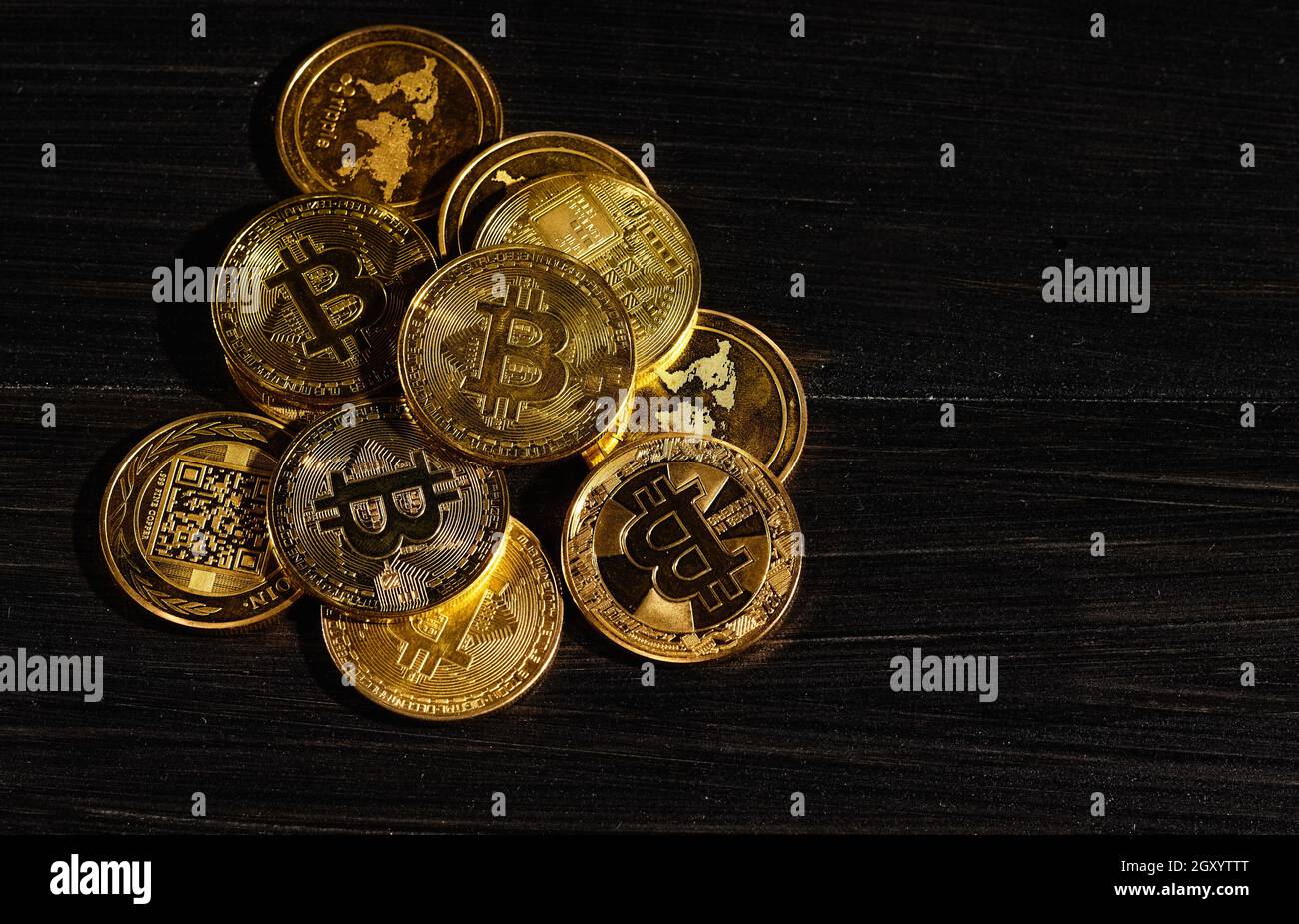 Leader in cryptocurrency bitcoin BTC on a top of coins against black ...