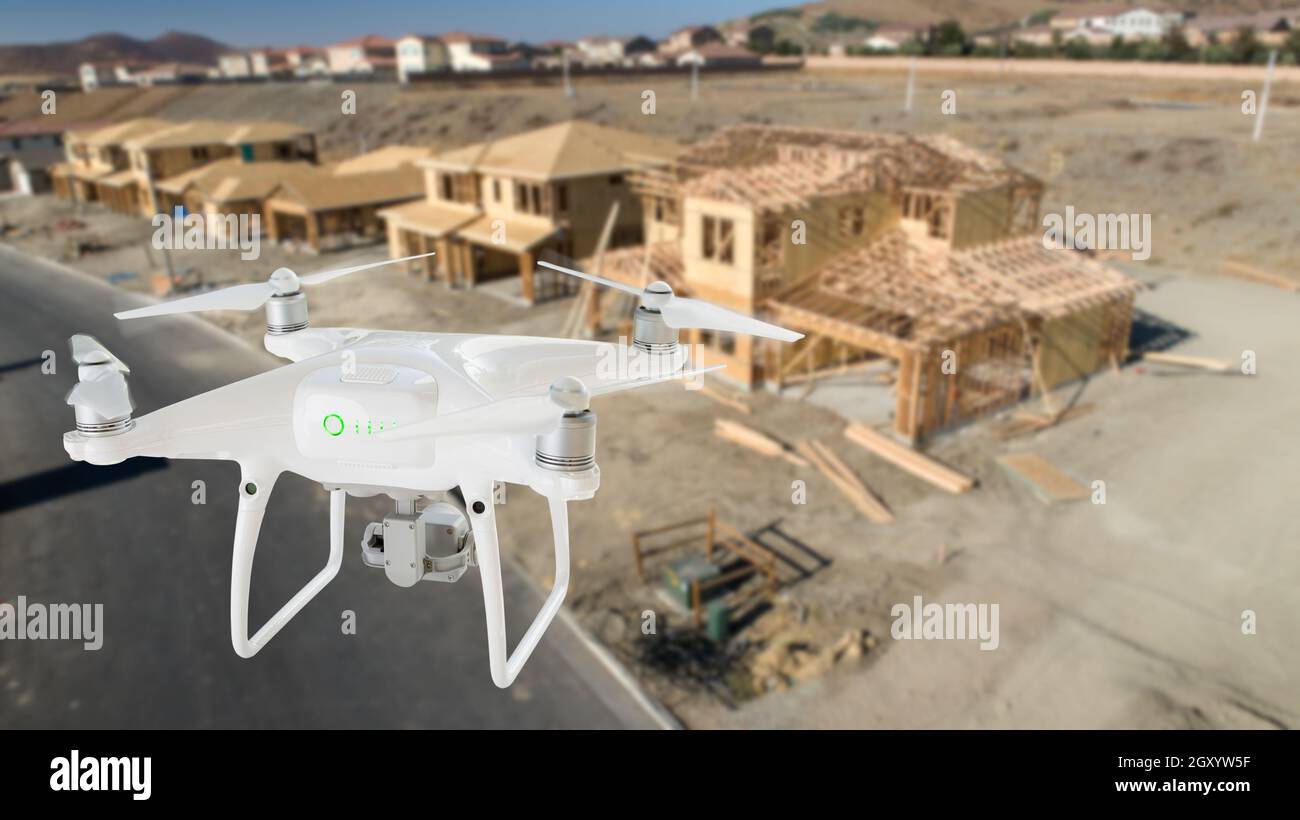 Unmanned Aircraft System (UAV) Quadcopter Drone In The Air Over ...