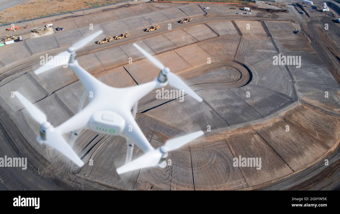 Unmanned Aircraft System (UAV) Quadcopter Drone In The Air Over ...