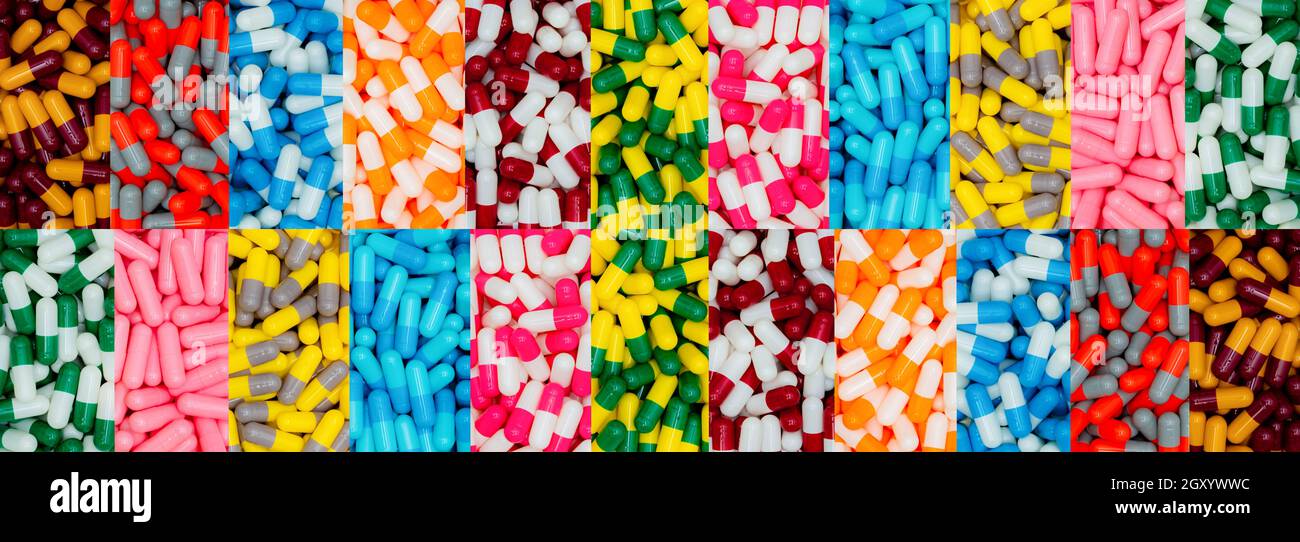 Top view of multi-color capsule pills. Pharmaceutical industry. Many ...