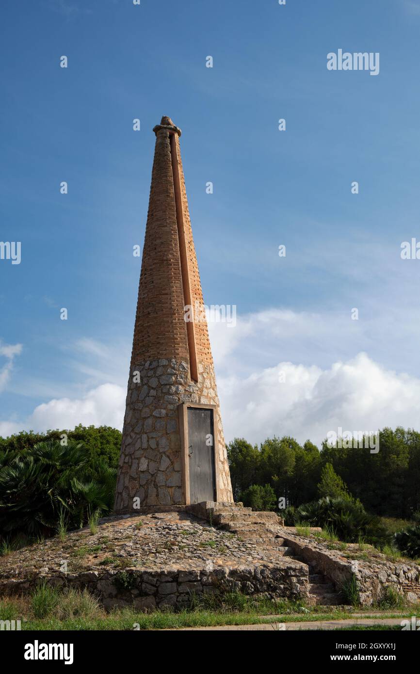 Obelisk built of stone and bricks surrounded by nature in the ...
