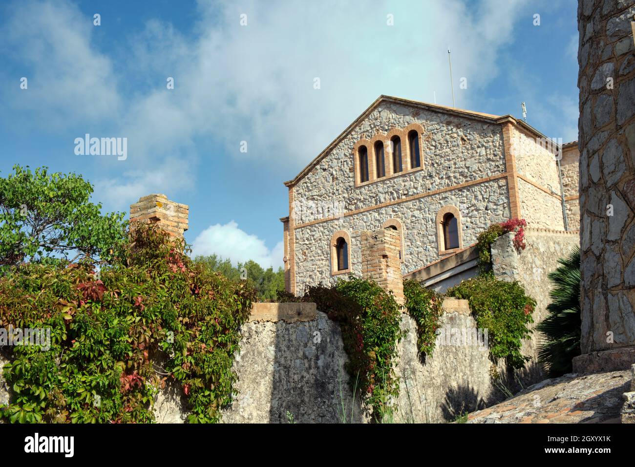 Typical Catalan architectural house built of stone and bricks with a ...