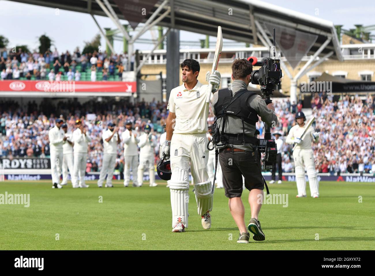 England’s Alastair Cook walks off the field for the final time after ...