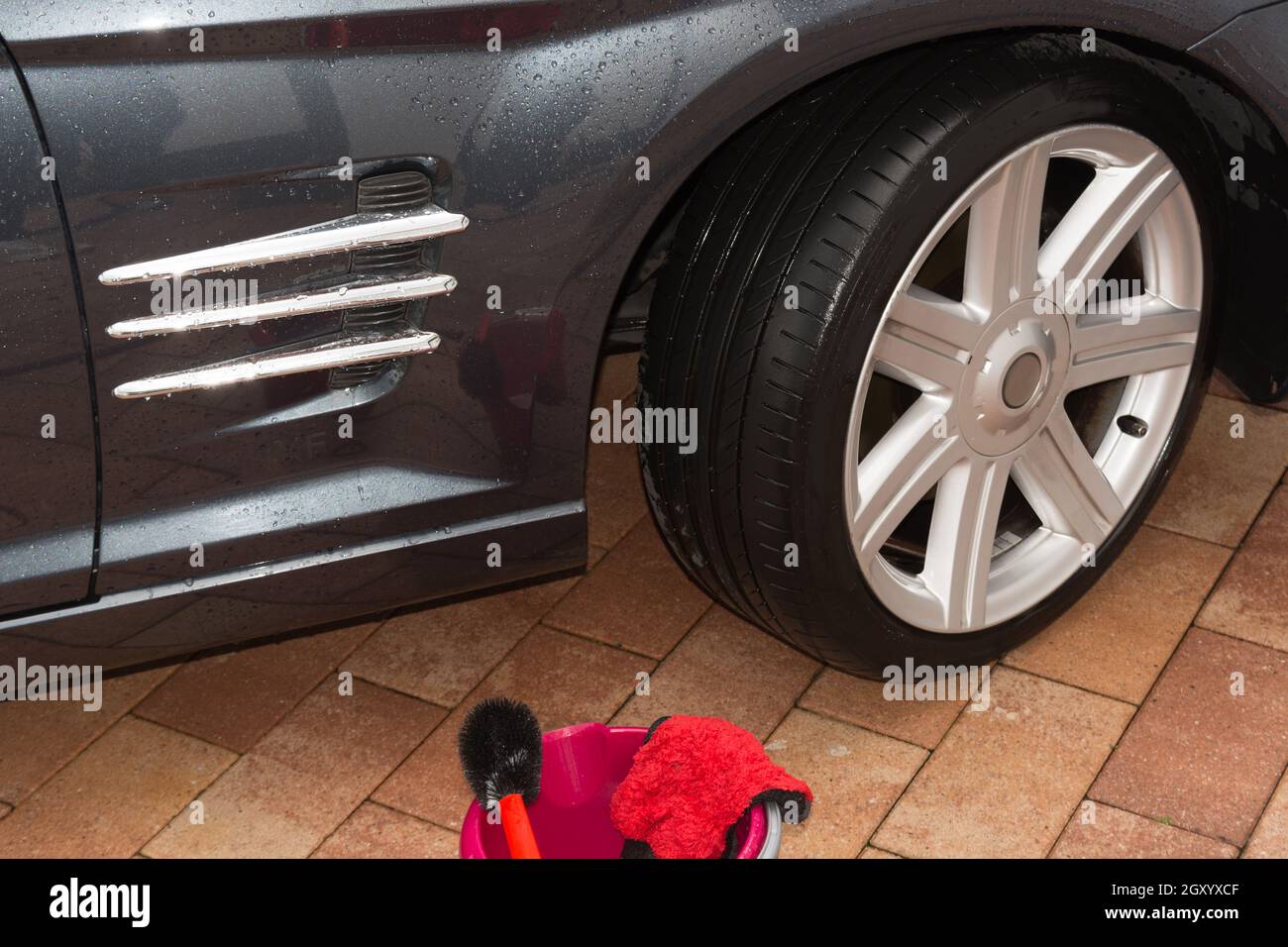 Car rims cleaning, car detailing wash concept. Cropped close up photo ...