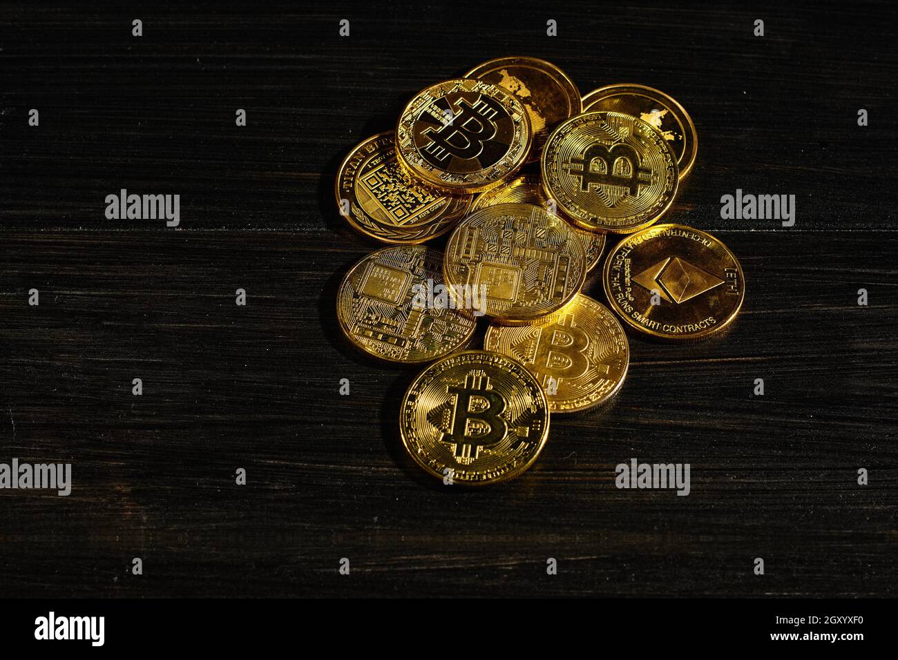 Leader in cryptocurrency bitcoin BTC on a top of coins against black ...