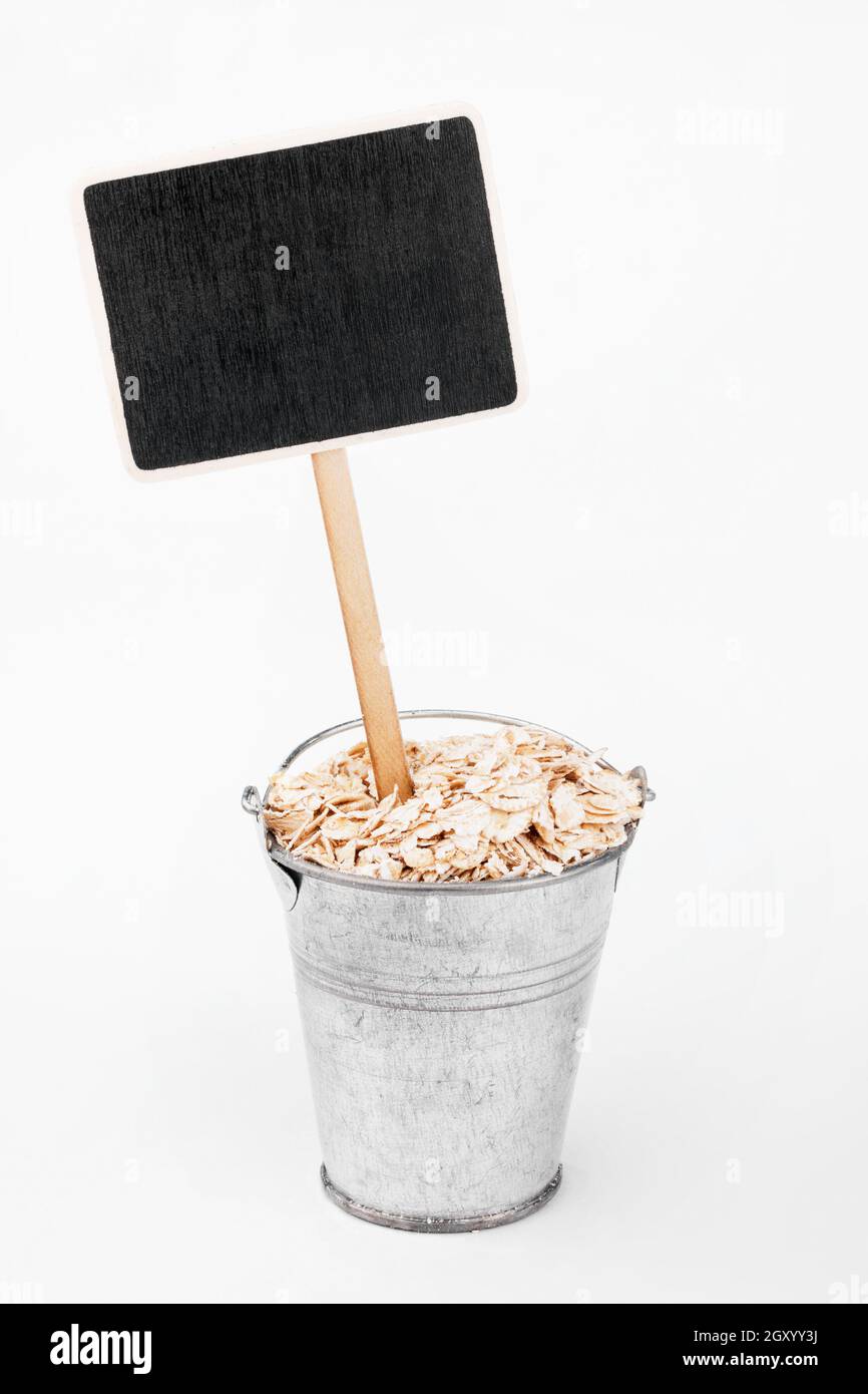 Pointer, price in bucket of oat flakes, on a white background Stock ...
