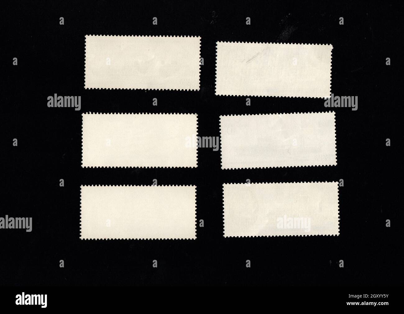 Reverse side of stamp isolated on black background. Postage stamps on ...