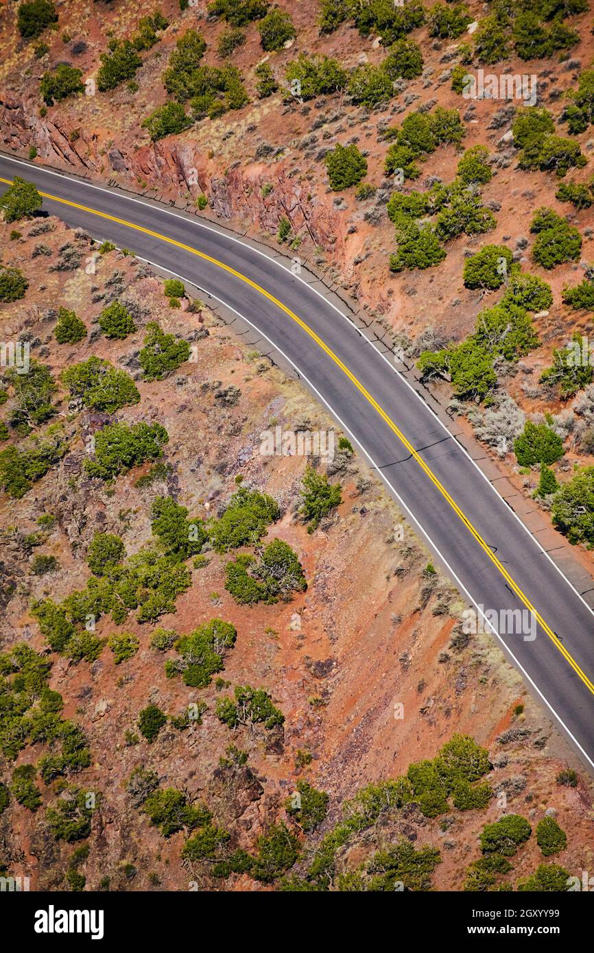 Road curving through desert landscape Stock Photo - Alamy