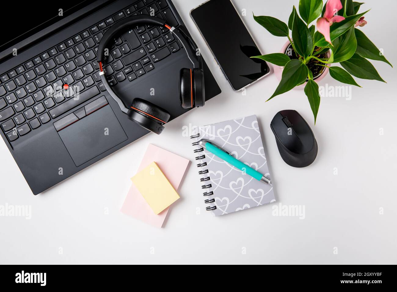 Workplace and office desk with laptop, headset and smarthpone. Flatlay ...