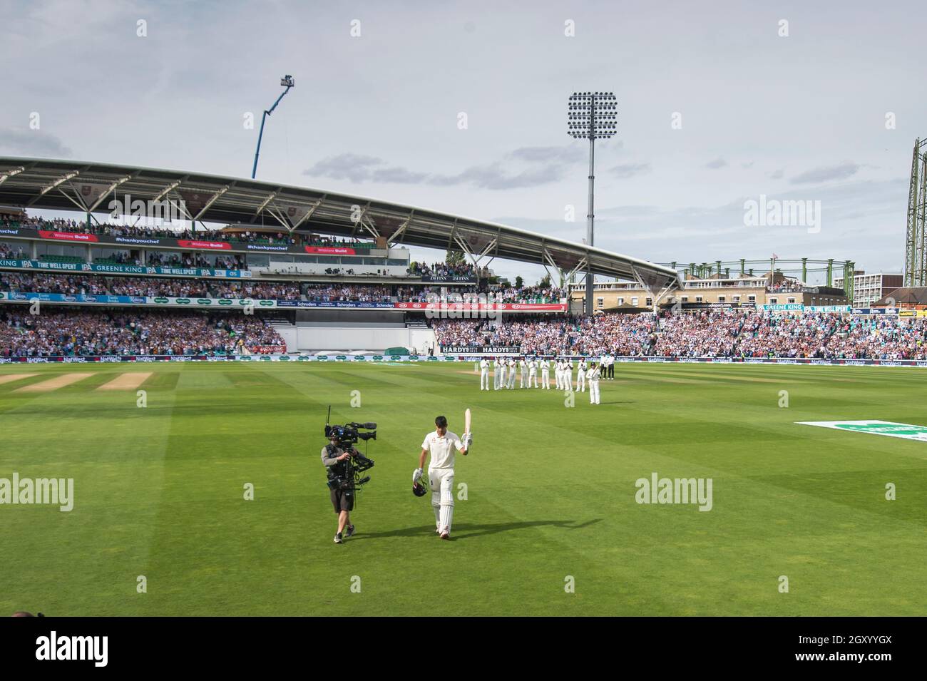 England’s Alastair Cook walks off the field for the final time after ...