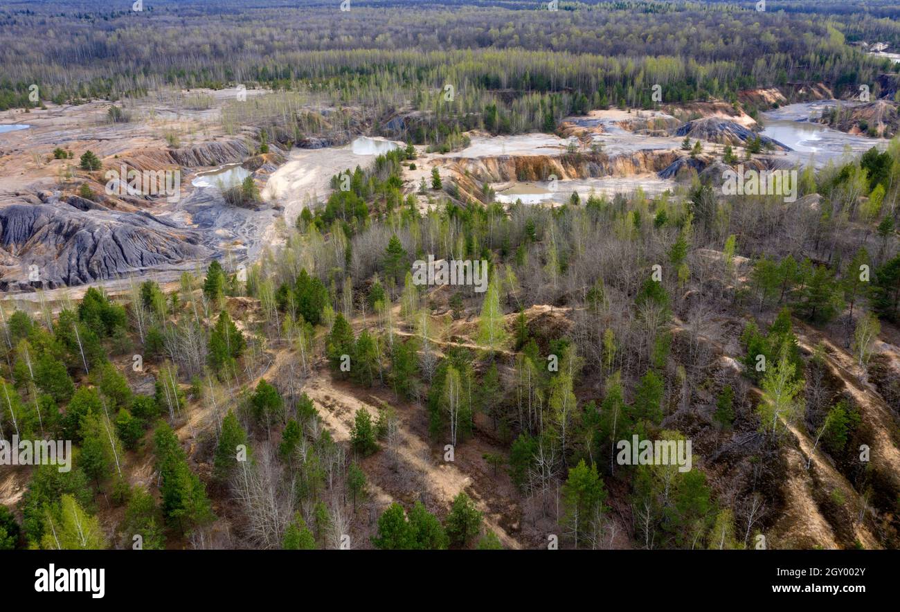 Aerial view of abandoned quarry with canyons and cracks Stock Photo - Alamy