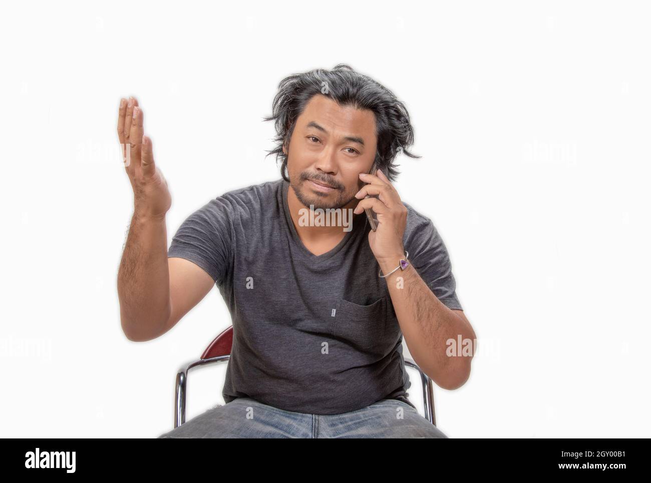 Putting hand up to speak hi-res stock photography and images - Alamy