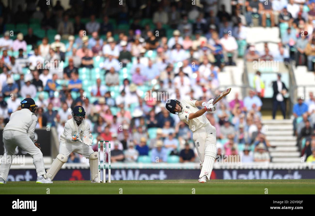 England’s captain Joe Root celebrates scoring 100 not out during the ...