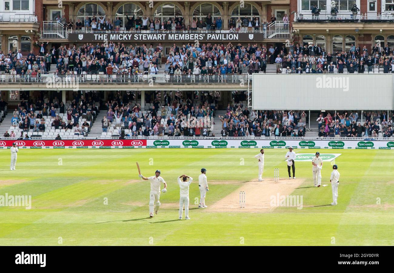 England’s Alastair Cook celebrates scoring 100 during his final test ...