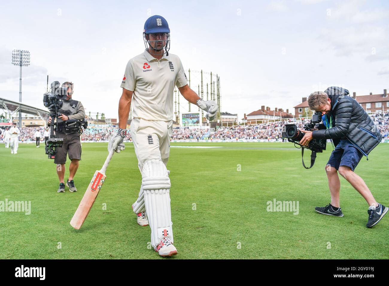 England’s Alastair Cook leaves the field at lunch after scoring 100 ...