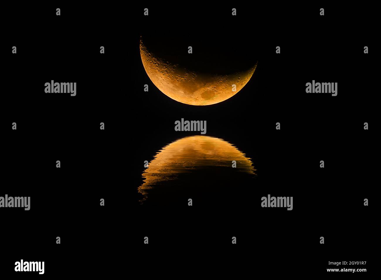 The crescent moon and shadows in the water. Elements of the furnished ...