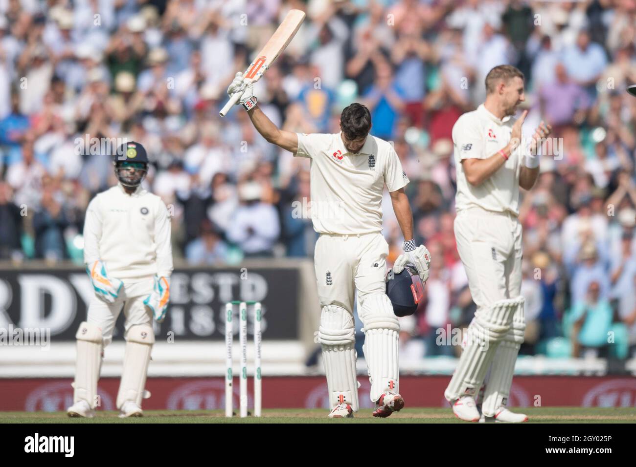 England’s Alastair Cook celebrates scoring 100 during his final test ...