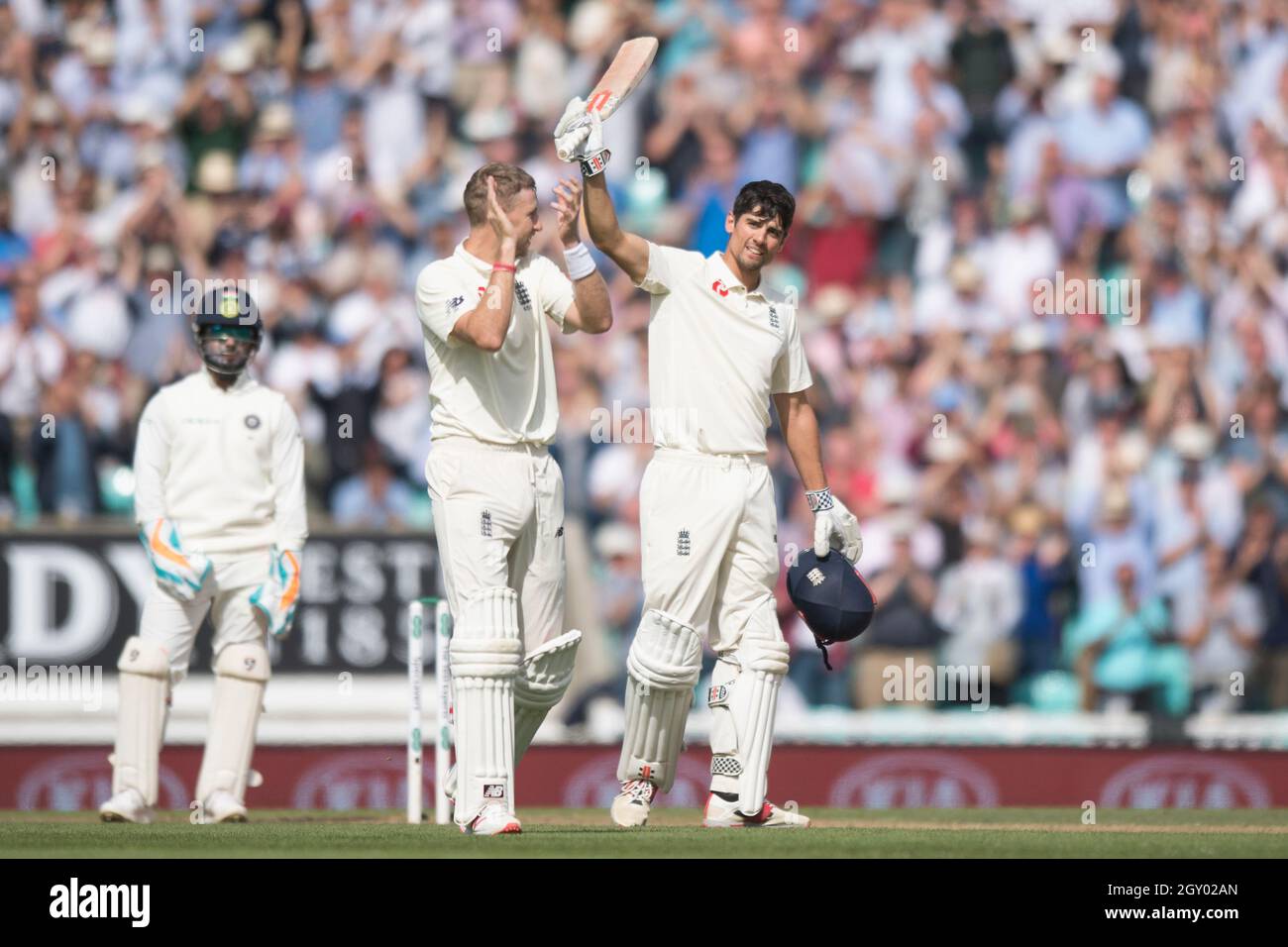England’s Alastair Cook celebrates scoring 100 during his final test ...
