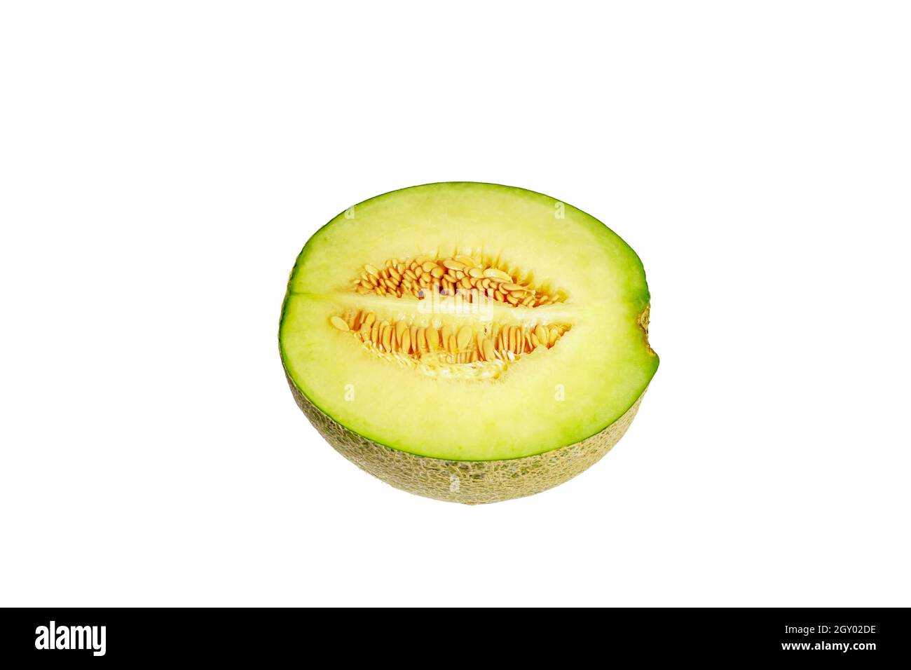 The green melon cut in half isolated on a white background Stock Photo ...