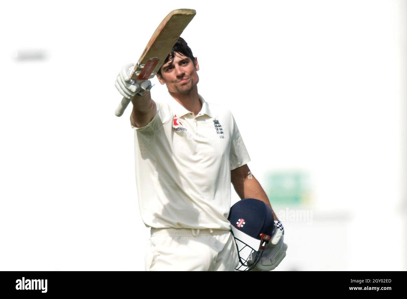 England’s Alastair Cook celebrates scoring 100 during his final test ...