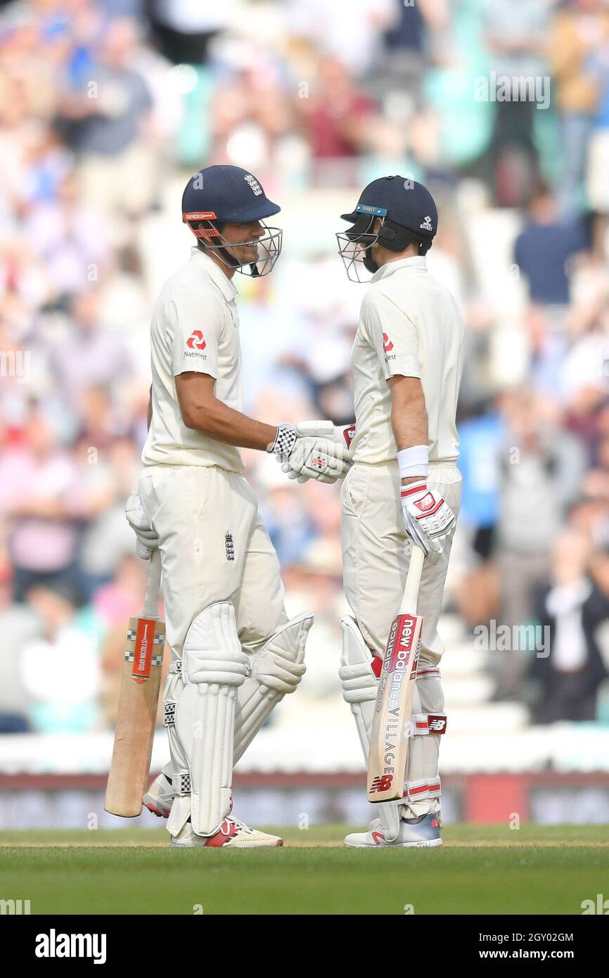 England’s Alastair Cook celebrates scoring 100 during his final test ...