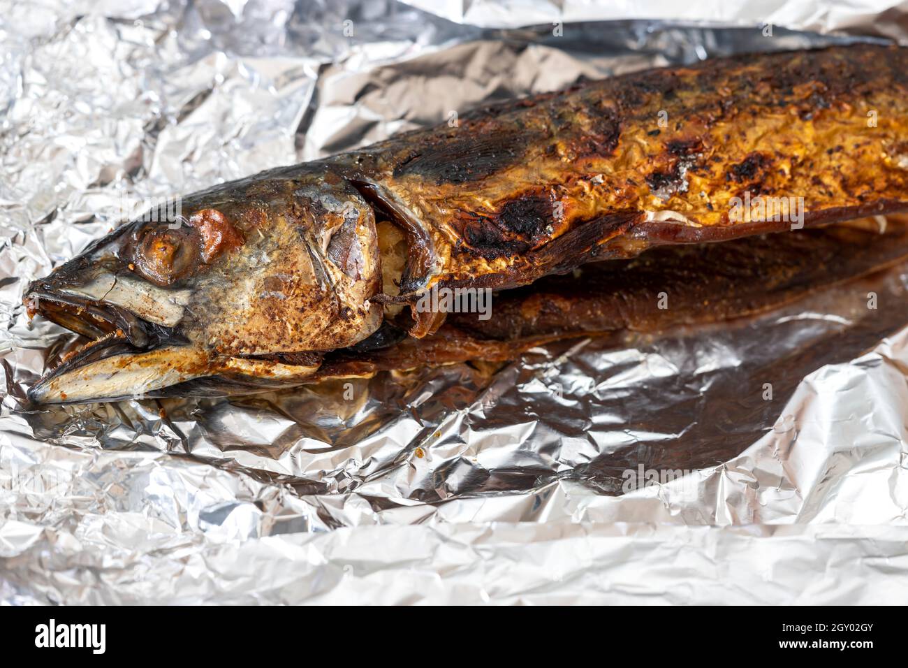 Smoked fish and aluminium foil hi-res stock photography and images - Alamy