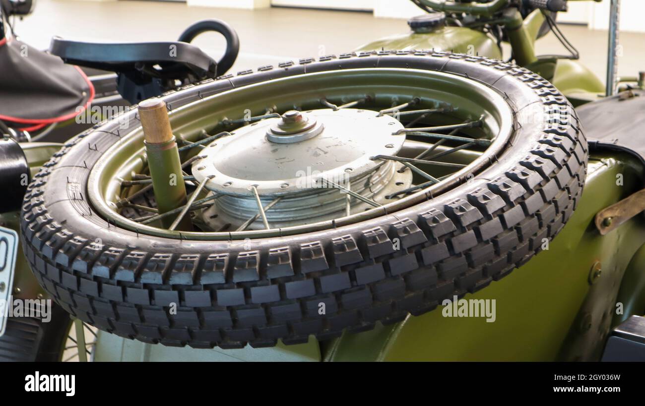 An old Soviet military motorcycle with a camouflage sidecar K-750, a ...