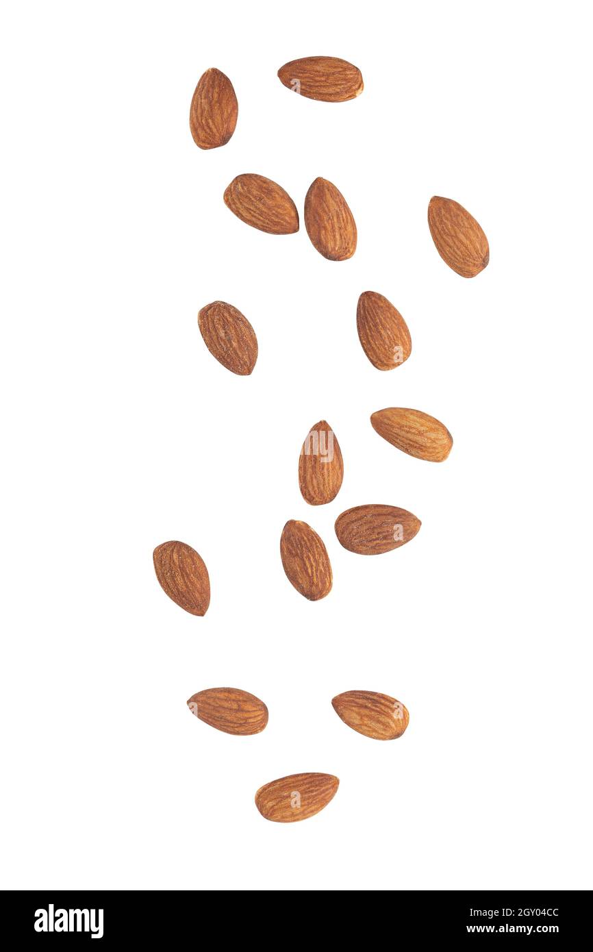Almonds falling isolated on white background with clipping path Stock ...