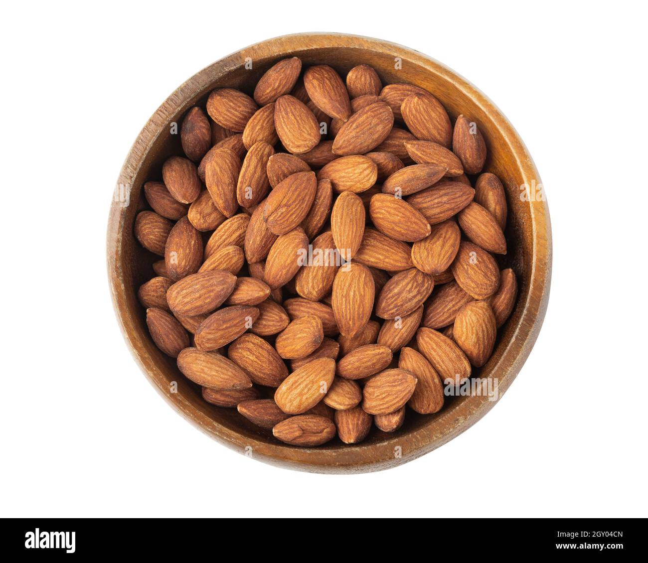 Almonds in wooden bowl isolated on white background with clipping path ...
