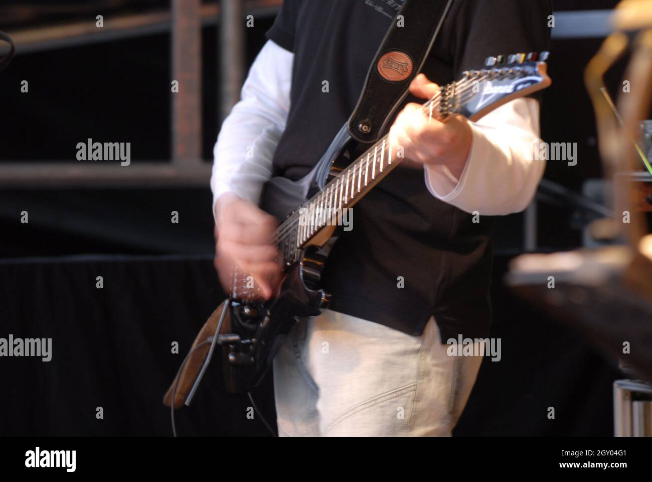bassist with guitar Stock Photo - Alamy