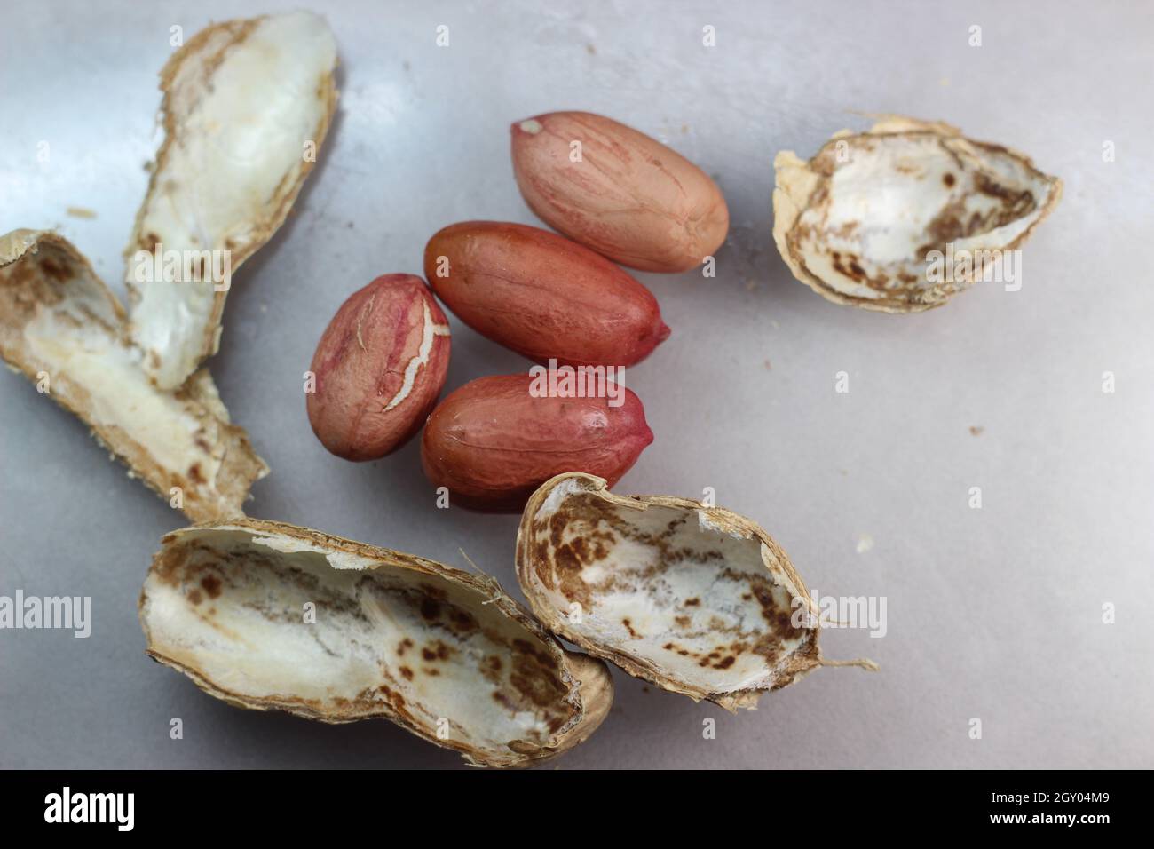 Unpeeled peanut with shells. Food background of peanuts Stock Photo - Alamy
