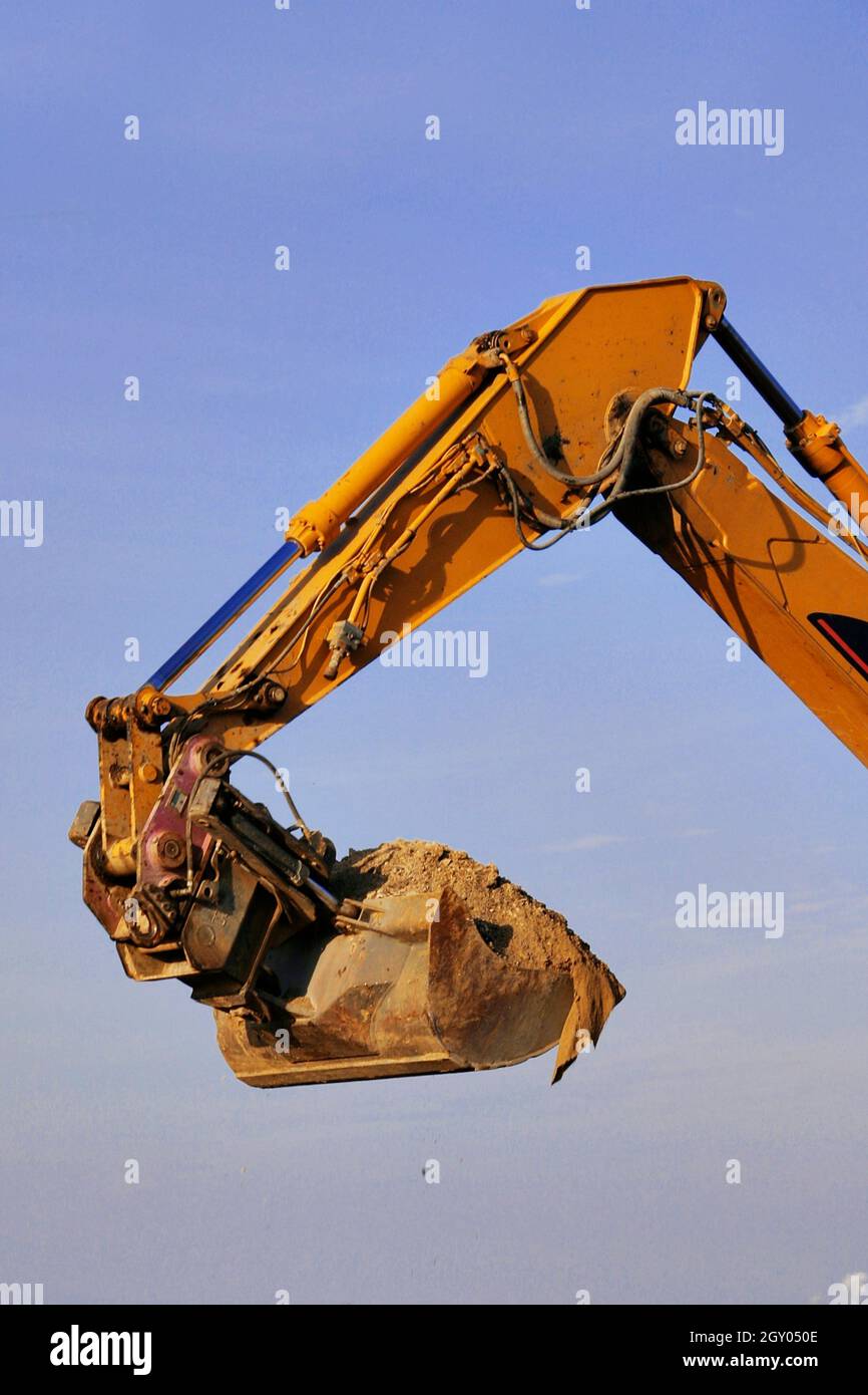 Blue excavators machines hi-res stock photography and images - Alamy