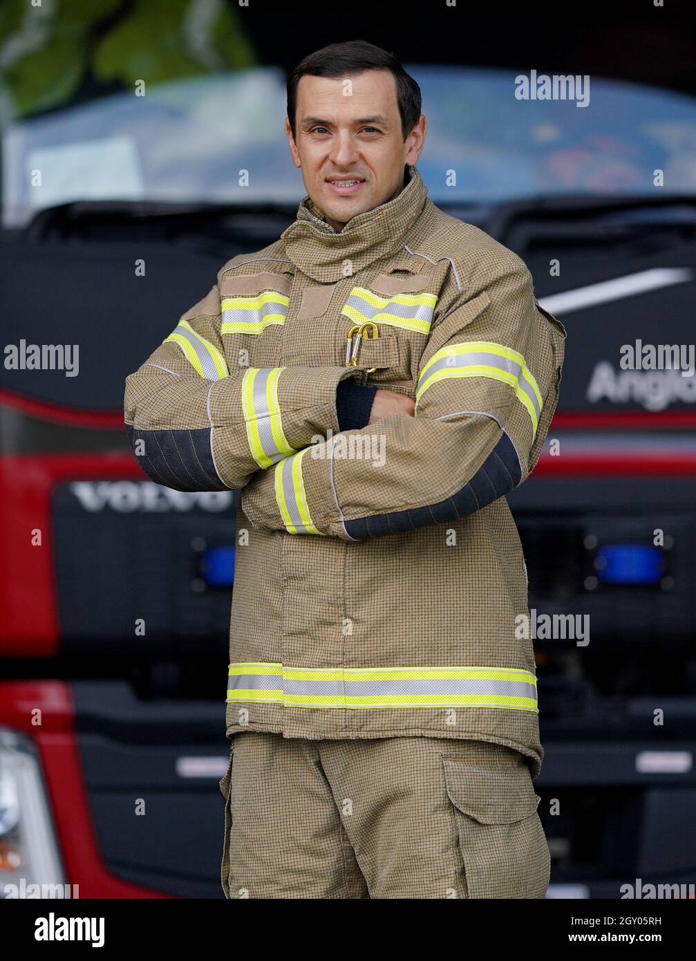 Former football player now fire fighter, Alex Nicholls poses for a ...