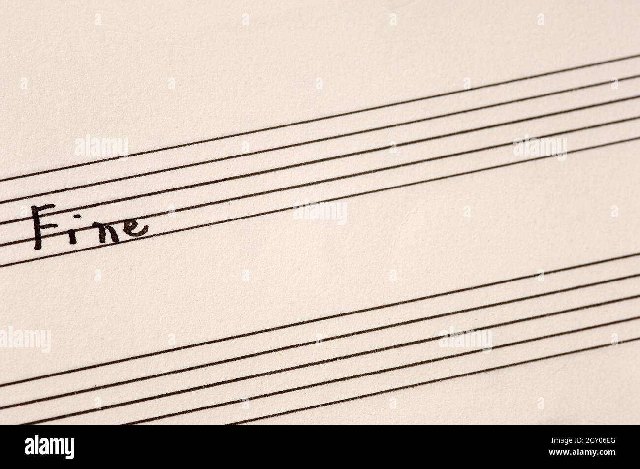 empty sheet of music and the word Fine Stock Photo - Alamy
