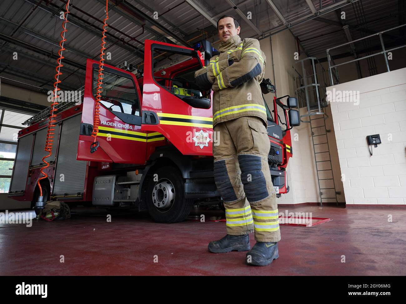 Former football player now fire fighter, Alex Nicholls poses for a ...